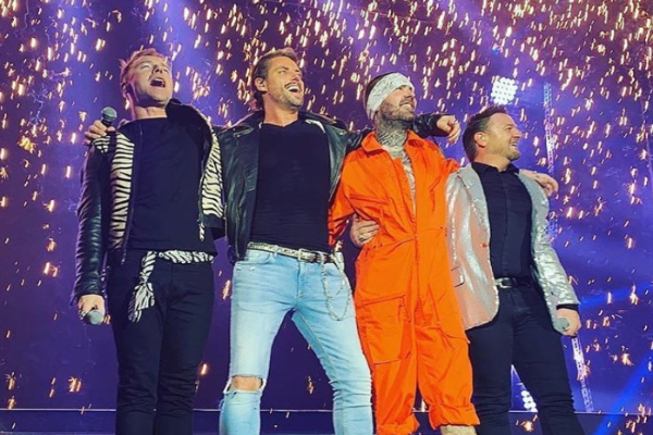 Boyzone members pay tribute as they mark 16 years since Stephen...