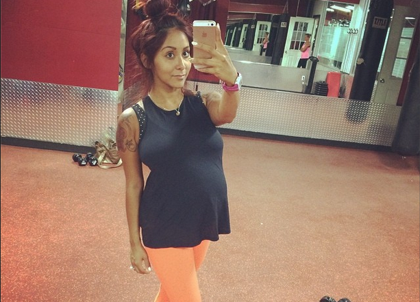 Snooki hits the gym for a tough workout... at eight months...